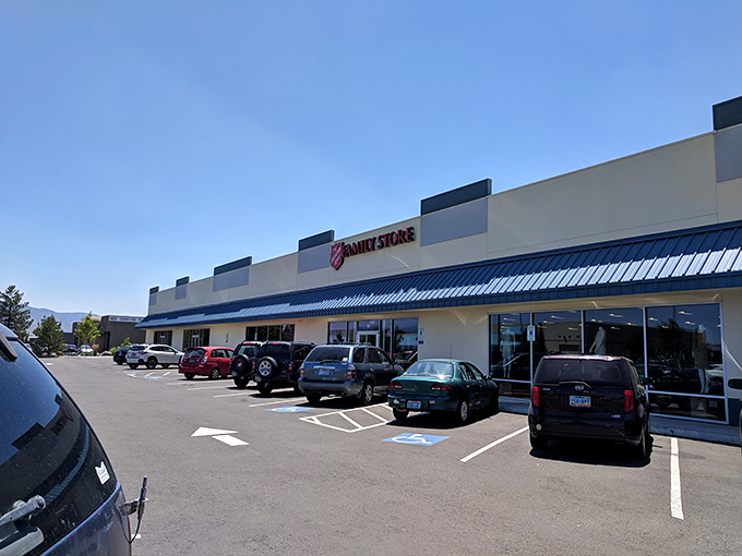 Rows of parked cars hint at the shopping excitement waiting inside this Carson City thrifting destination.