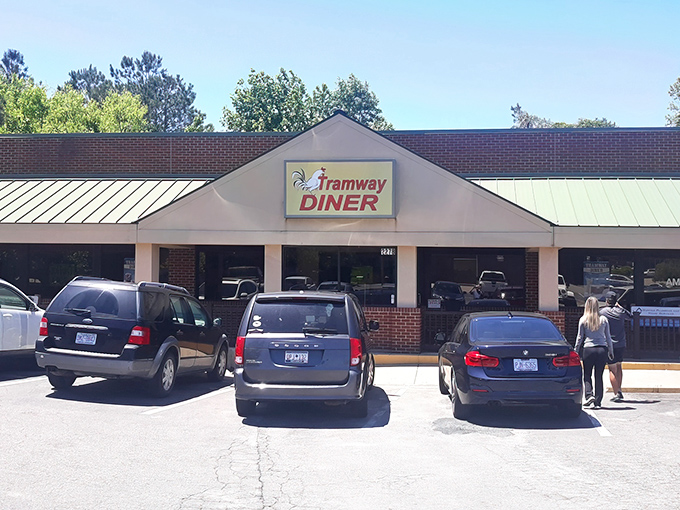 Full parking spots tell the story at Tramway Diner. When locals line up like this, you know the pancakes are worth the wait!