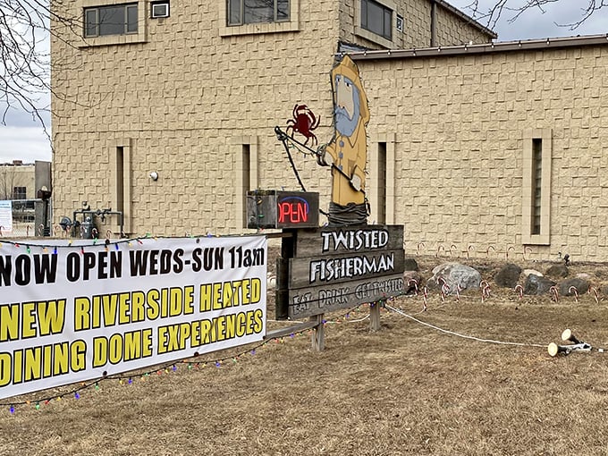 "Heated dining domes by the river?" The Twisted Fisherman's sign promises Wisconsin winter warriors a taste of summer all year round.