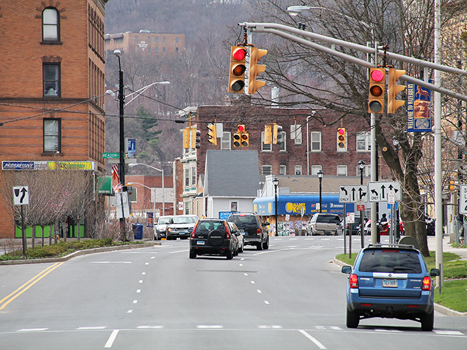 Those rolling hills in the background frame streets where affordable living meets authentic New England character beautifully.