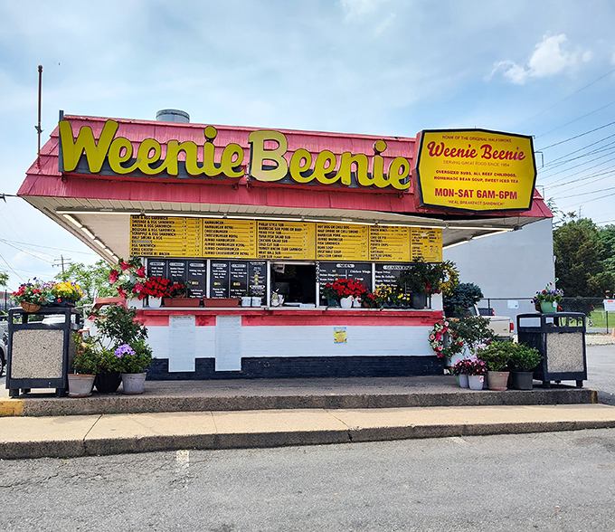 Flower pots add a touch of charm to this no-nonsense hot dog stand where locals have been getting their fix for generations.