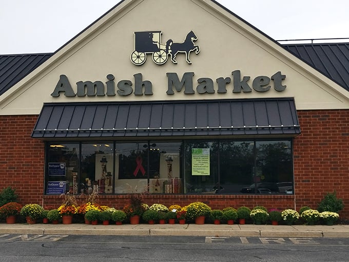 Colorful mums line the entrance to this Amish treasure trove. The perfect spot to find everything from hand-rolled butter to quilts that tell stories.