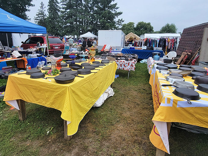 Bright yellow tablecloths transform ordinary cast iron into extraordinary discoveries&mdash;this is bargain hunting at its finest, folks.