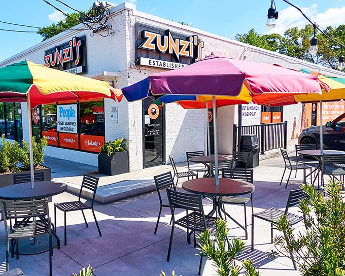 Rainbow umbrellas create a cheerful oasis at Zunzi's. This little slice of South African-inspired heaven makes waiting in line feel like part of the adventure.