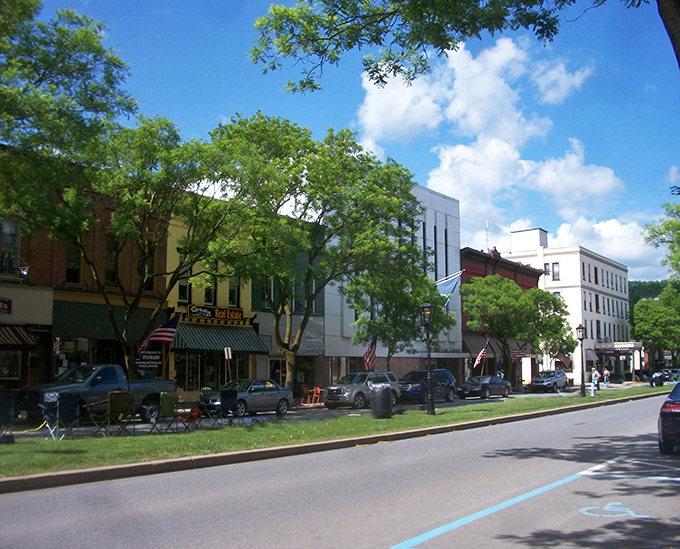Tree-lined streets frame Wellsboro's charming storefronts, creating a downtown that feels like it was designed specifically for leisurely Saturday strolls and impromptu ice cream stops.