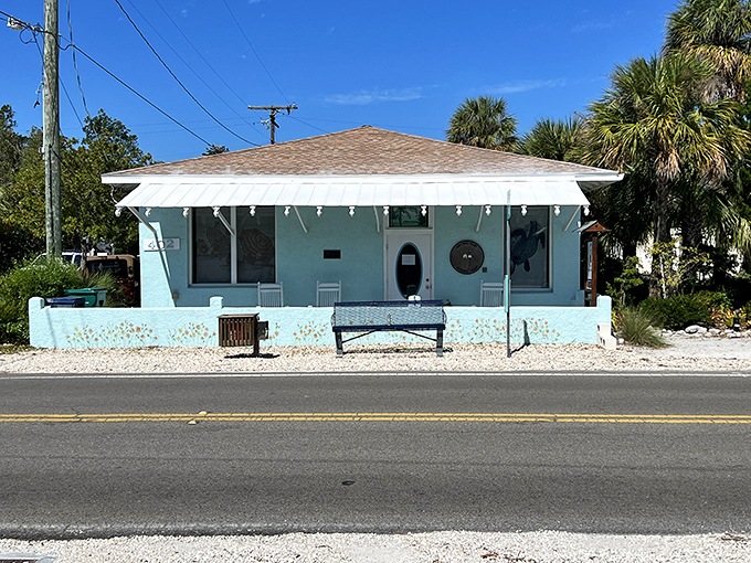 Old Florida charm preserved in pastel perfection. This mint-colored cottage whispers stories of simpler times when beach houses didn't need to be McMansions.