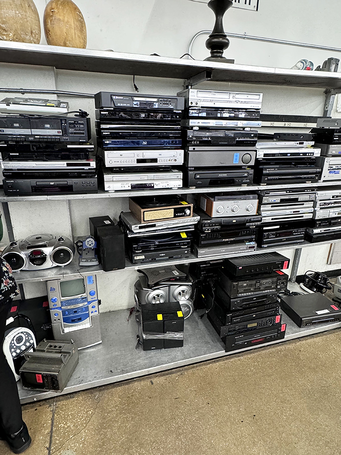 Technology graveyard or vintage tech museum? This wall of electronics tells the story of how we've consumed media over decades.