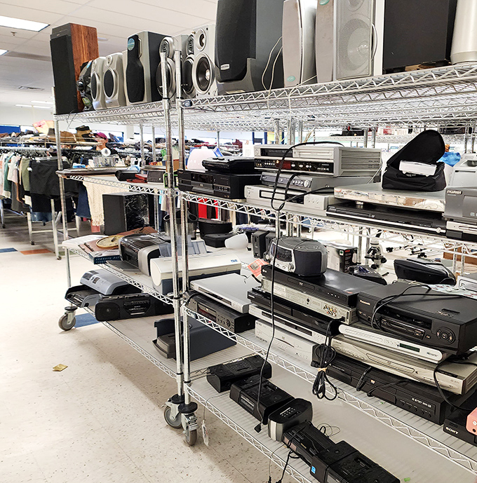 Electronics from every era peacefully coexist, like a United Nations summit for forgotten gadgets.