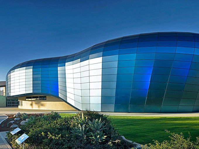 The Aquarium of the Pacific isn't just a building&mdash;it's a shimmering blue wave frozen in architectural form, housing thousands of creatures who never pay rent.