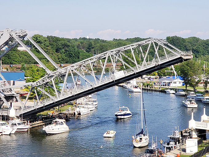 The iconic Ashtabula Lift Bridge performs its daily mechanical ballet, rising to welcome boats while offering spectators a free engineering show worth every non-penny.
