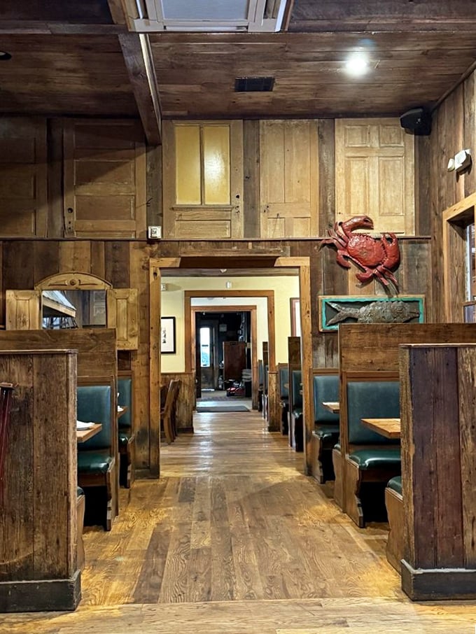 Wooden booths, exposed beams, and that watchful red crab on the wall &ndash; dining at Parrain's feels like eating in your Louisiana grandpa's cabin.