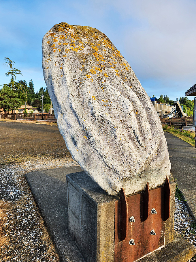 Standing tall and proud, this shellfish sculpture shows off its weathered patina like a badge of coastal honor.