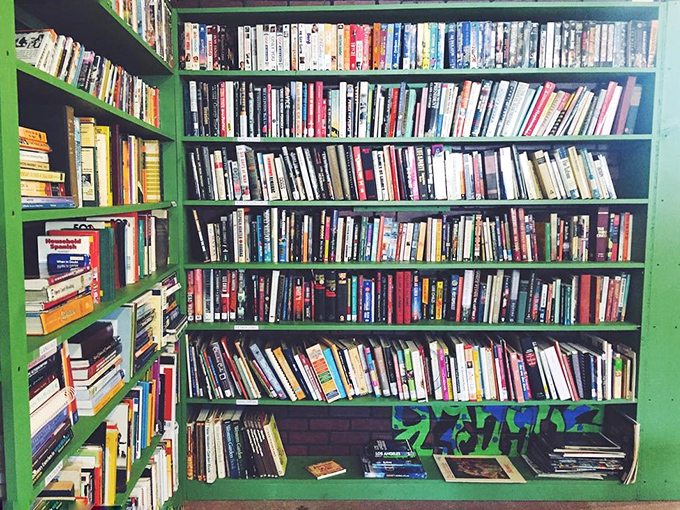 Literary treasure hunters, prepare to lose track of time. These green shelves hold everything from forgotten bestsellers to that cookbook your grandmother swore by.
