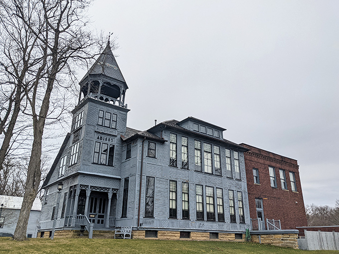 The Boston Township Hall stands as a Victorian architectural masterpiece, its distinctive tower watching over Peninsula like a benevolent time traveler from another century.
