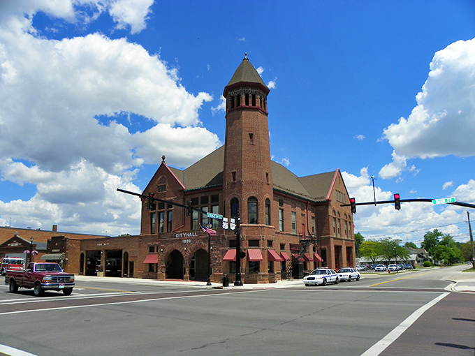 City Hall commands the corner with its distinctive tower, looking like it wandered straight out of a Norman Rockwell painting into the 21st century.