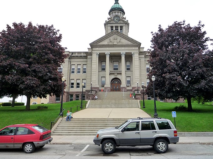 The Winneshiek County Courthouse stands like a limestone guardian, watching over sensible property values and peaceful neighborhoods.