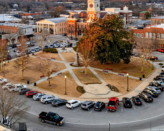 The iconic Newton County Courthouse stands sentinel over Covington Square, its clock tower keeping time for generations of Georgia residents and Hollywood film crews alike.