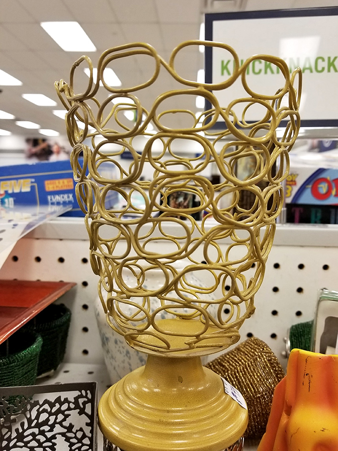 This golden wire basket perfectly embodies thrift store philosophy&mdash;is it art? Is it storage? At this price, why not both?
