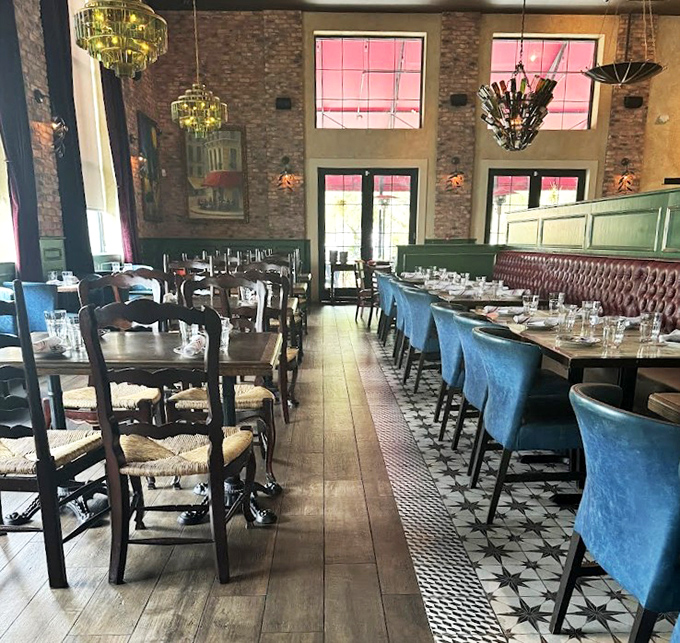 High ceilings, exposed brick, and blue banquettes create the perfect setting for your "I can't believe I ate the whole thing" moment.