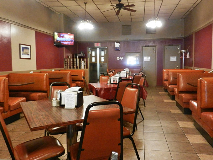 Orange vinyl booths that have cradled countless Ohioans through breakfast, lunch, and dinner. Comfort food deserves comfortable seating.