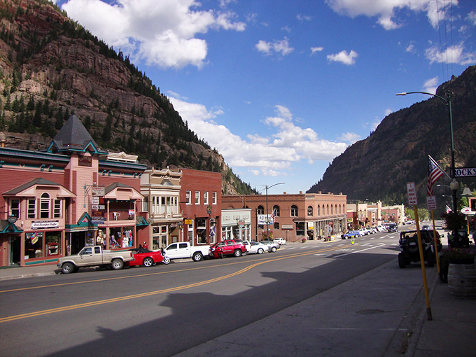 Main Street Ouray—where the Wild West got a makeover but kept its soul. Those mountains aren't a backdrop; they're nosy neighbors.