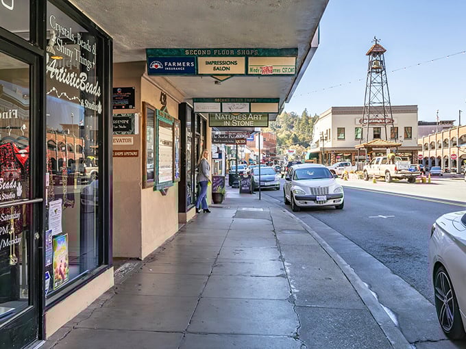 Stroll under covered walkways past shops that would make Hallmark movie scouts weep with joy. That bell tower stands sentinel over downtown like a Victorian timekeeper.