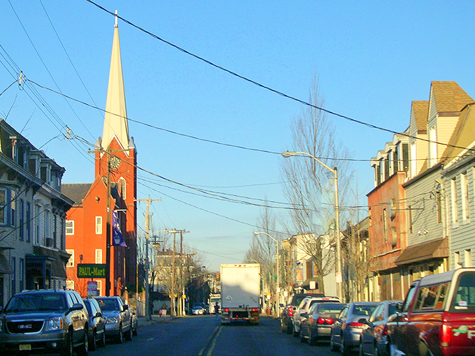 The bright orange church steeple stands as both spiritual beacon and convenient landmark for giving directions to out-of-town visitors.