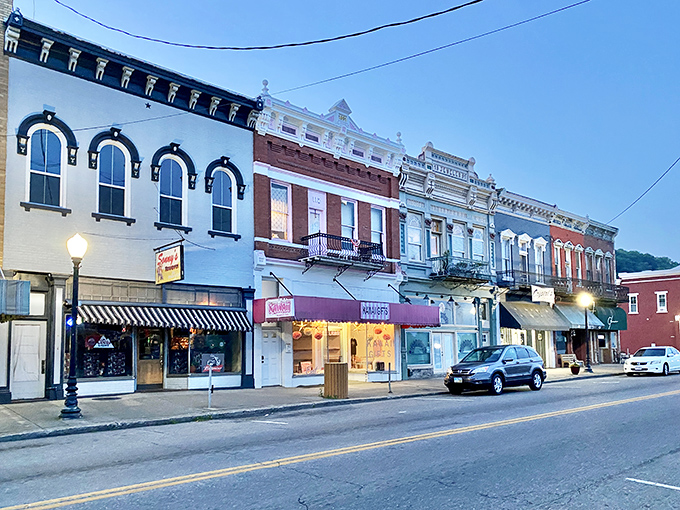 Twilight transforms Pomeroy's historic facades into a watercolor painting. These 19th-century storefronts have witnessed generations of Ohio River life flowing past their doorsteps.