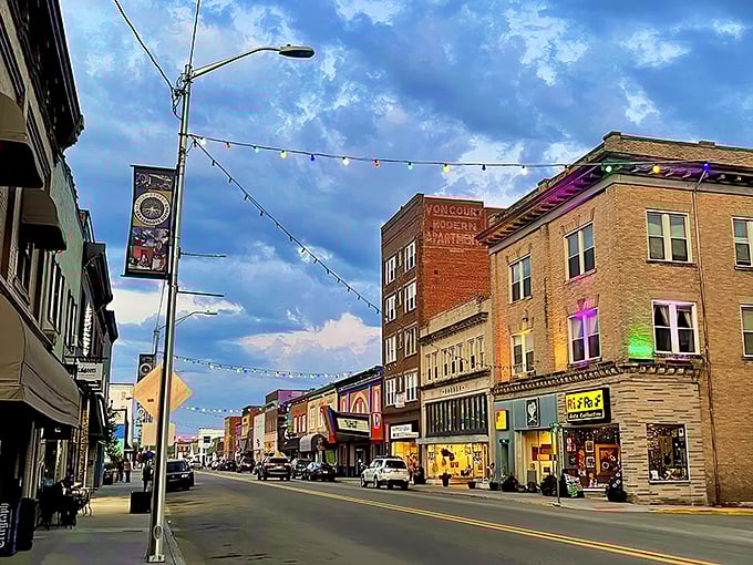 As evening approaches, the string lights above Mercer Street flicker to life, transforming downtown Princeton into a postcard-perfect scene.