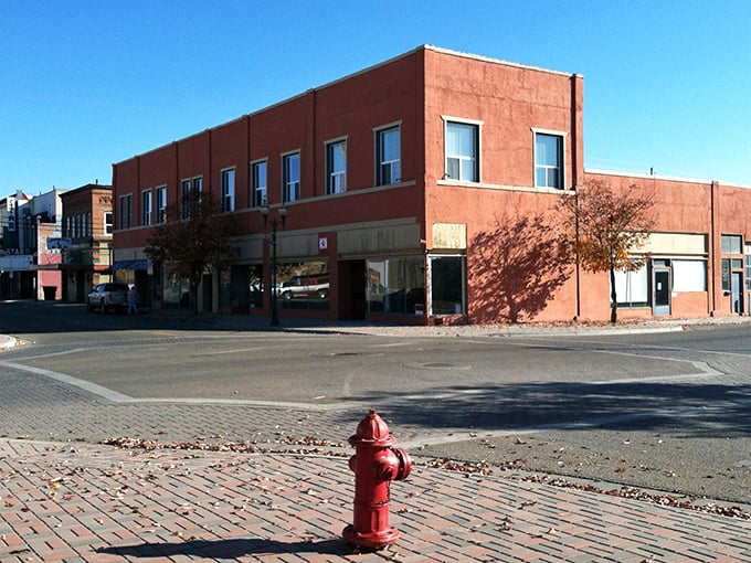 Downtown's brick buildings stand like patient sentinels of simpler times, when a fire hydrant was the most exciting street installation around.