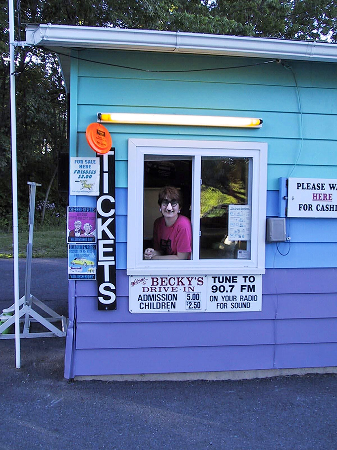 The iconic blue ticket booth&mdash;where your evening of nostalgia officially begins with that satisfying ticket tear sound.