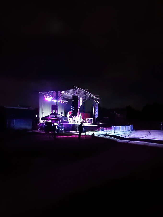 After dark, the magic truly begins. This small stage hosts live entertainment, proving the Starlight delivers more than just movies.