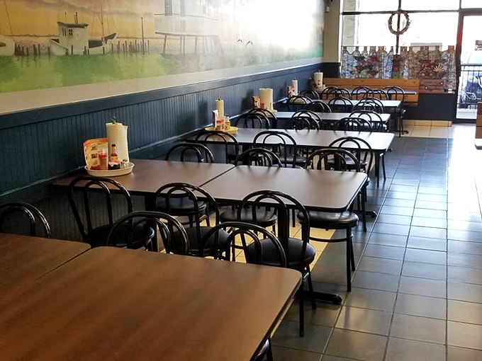 Simple tables await transformation into battlefields of delicious destruction, where crab mallets and paper towels become essential weaponry.