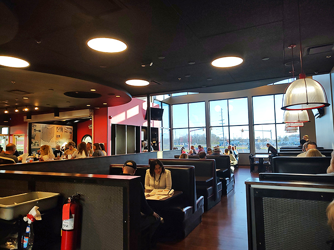 Spacious booths and thoughtful lighting create that perfect "special but comfortable" atmosphere where memories are made between bites.