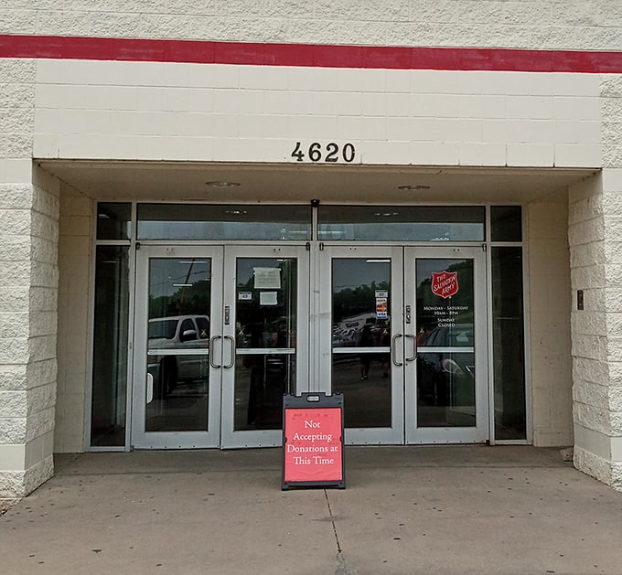 Sometimes the "Not Accepting Donations" sign appears, a gentle reminder that even thrift stores need breathing room between avalanches of generosity.