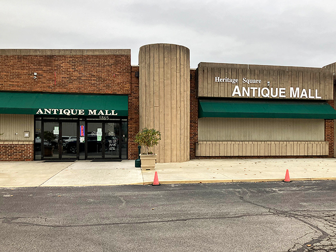 That green awning might as well be a welcome mat to the past. Step inside and prepare to lose track of both time and your shopping budget.