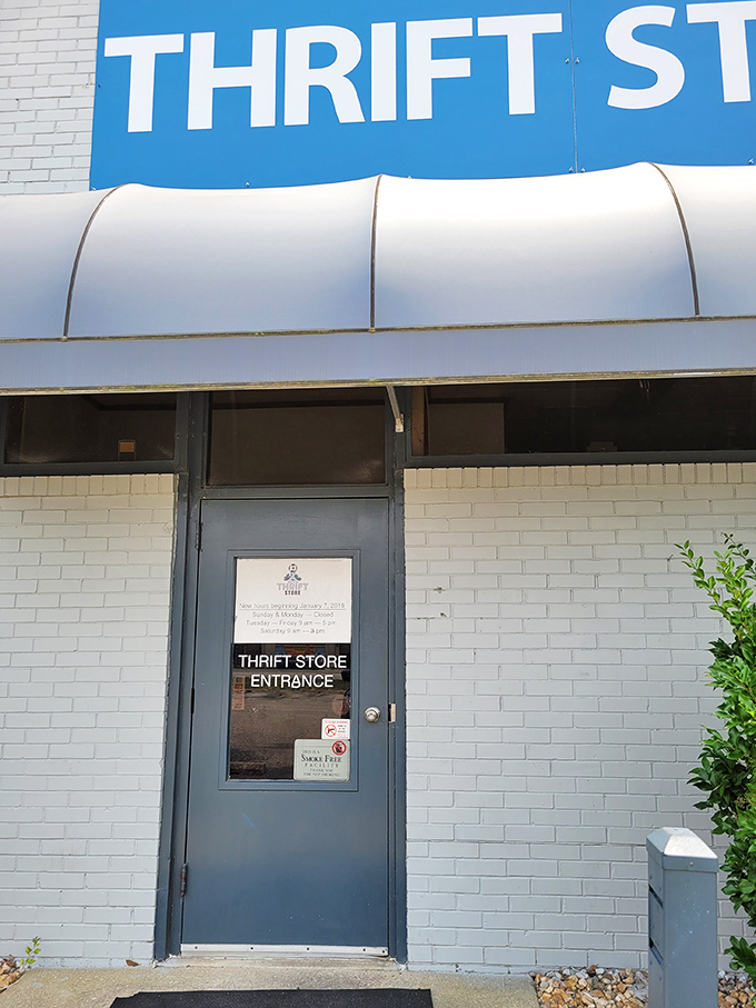 That blue awning and simple entrance? It's the wardrobe to Narnia for bargain hunters and nostalgia seekers alike.