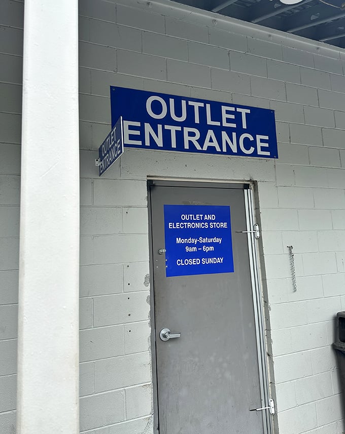 The blue sign beckons like a portal to another dimension&mdash;one where yesterday's castoffs become tomorrow's conversation pieces. Enter if you dare!