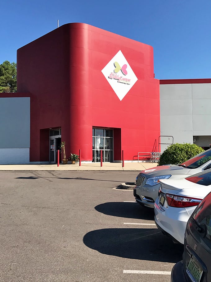 This isn't just an entrance&mdash;it's a portal to possibility. The vibrant red facade welcomes treasure hunters with the promise of unexpected finds.