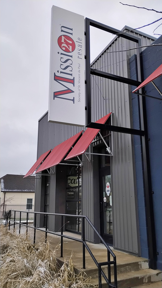 The towering Mission 27 sign stands like a beacon of hope for anyone who's ever complained about retail prices.