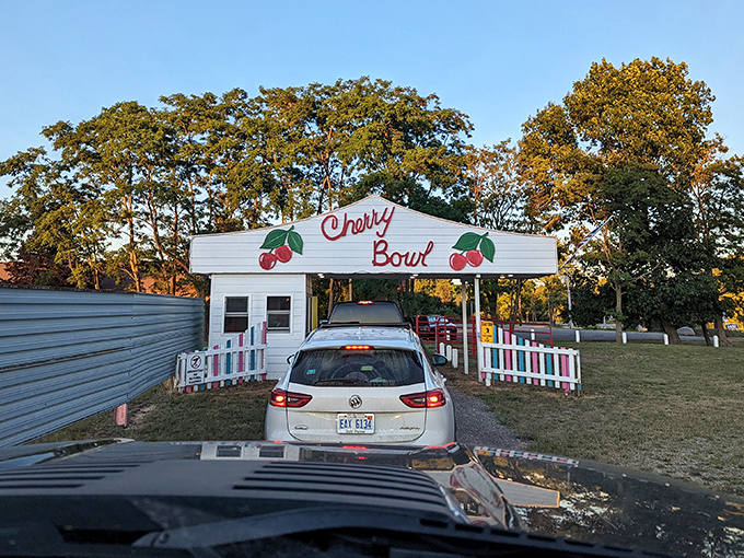 Pull up to this vintage booth where your evening of nostalgia officially begins with a smile.