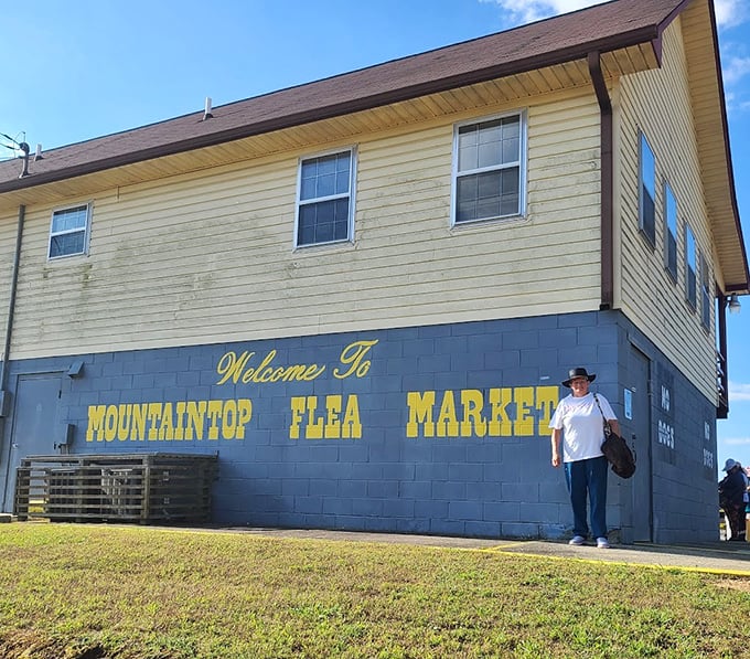 The blue welcome wall greets visitors like an old friend, a humble gateway to a world where one person's castoffs become another's prized possessions.