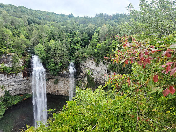 Mother Nature's ultimate magic trick: carving limestone cliffs over millennia, then adding the grand finale of twin cascades plunging dramatically into emerald pools below.