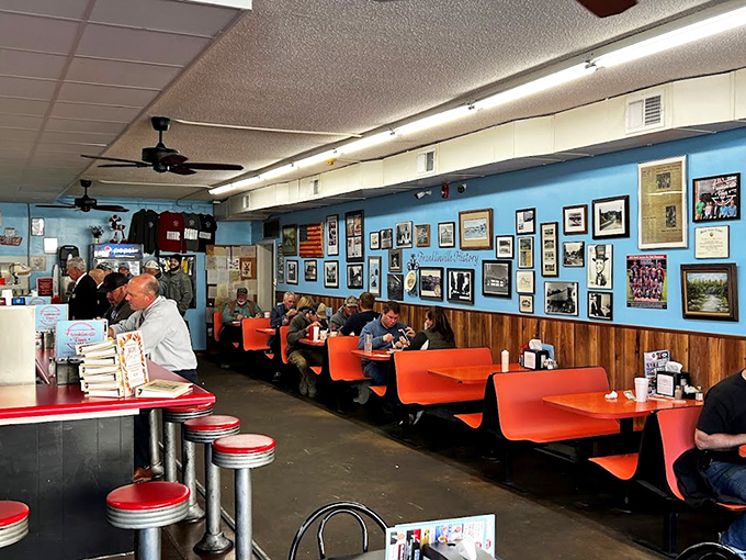 Those orange booths have witnessed more local news, family celebrations, and friendly debates than any social media platform ever could.