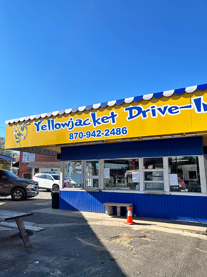Morning sunshine illuminates this no-frills roadside treasure, where the blue and yellow color scheme has become as iconic as the food itself.