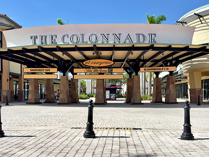 The grand entrance announces itself with all the subtlety of a Broadway marquee, promising retail adventures that won't require a second mortgage.