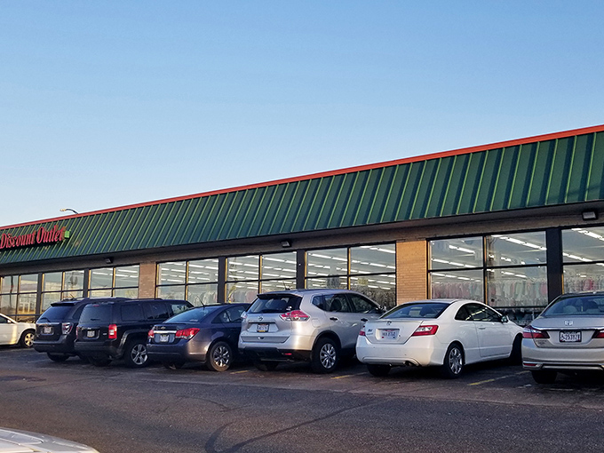 Morning light bathes the green-roofed thrift emporium. The full parking lot tells the story—savvy Ohioans know where the good stuff hides.