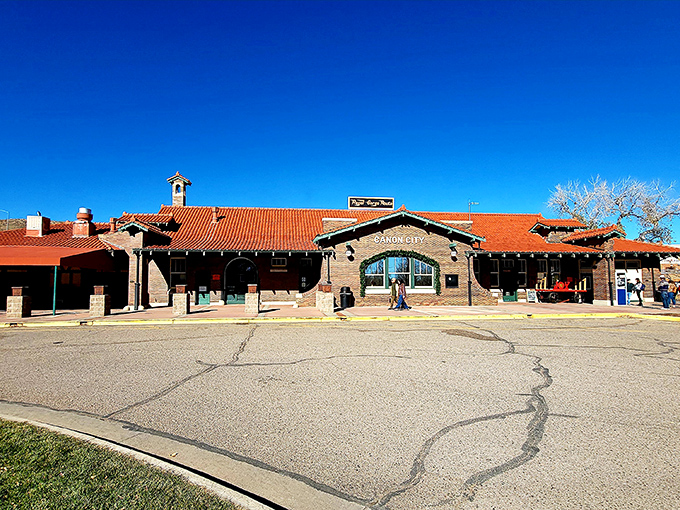 The Santa Fe Depot stands proudly with its Spanish-style architecture and terracotta roof—like a movie set where westerns and luxury travel collide.
