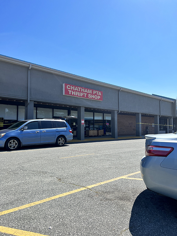 That bold red sign against the clear Carolina sky is like a beacon for bargain hunters. No fancy frills needed when what's inside speaks volumes.