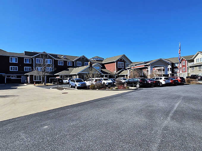 Blue skies frame this retirement paradise where residents trade lawn mowers for leisure time and home repairs for happy hours.